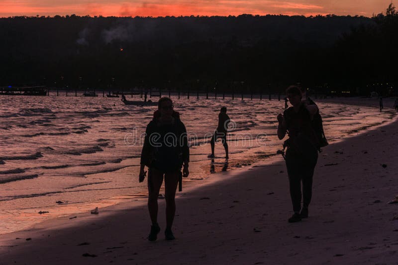 Two Backpacker Walking on the Beach at Sunset Editorial Image - Image ...
