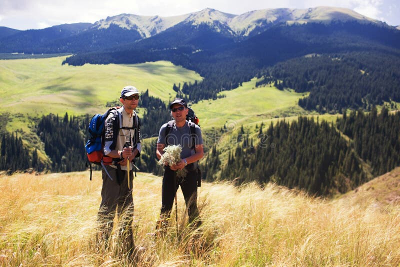 Two Backpackers in the Mountain Stock Image - Image of posing, rocky ...