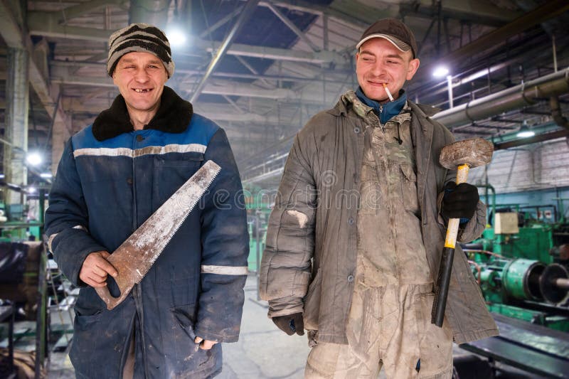 Two bad unskilled workers stock photo. Image of hammer - 266040382
