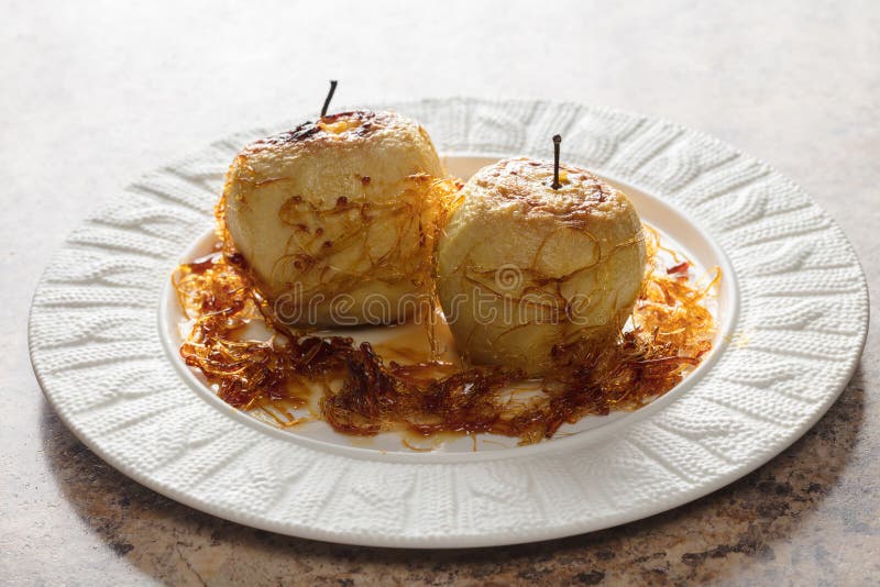 Two Baked Apples with Caramel Stock Photo - Image of oven, cooked: 84175758