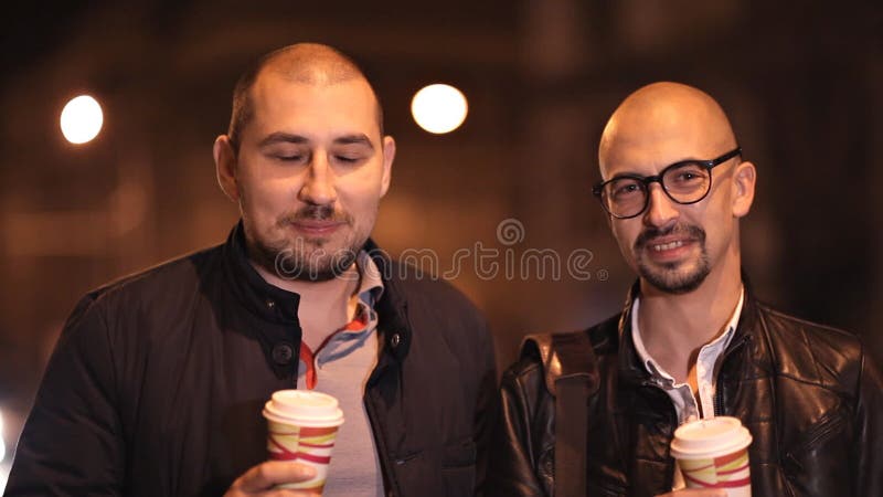 Two Bald Guys Pose for the Camera in the Evening Stock Video - Video of ...