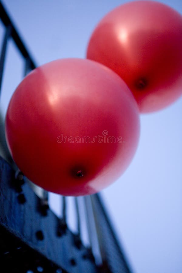 Two balloons flying away stock photo. Image of balloon - 63162822