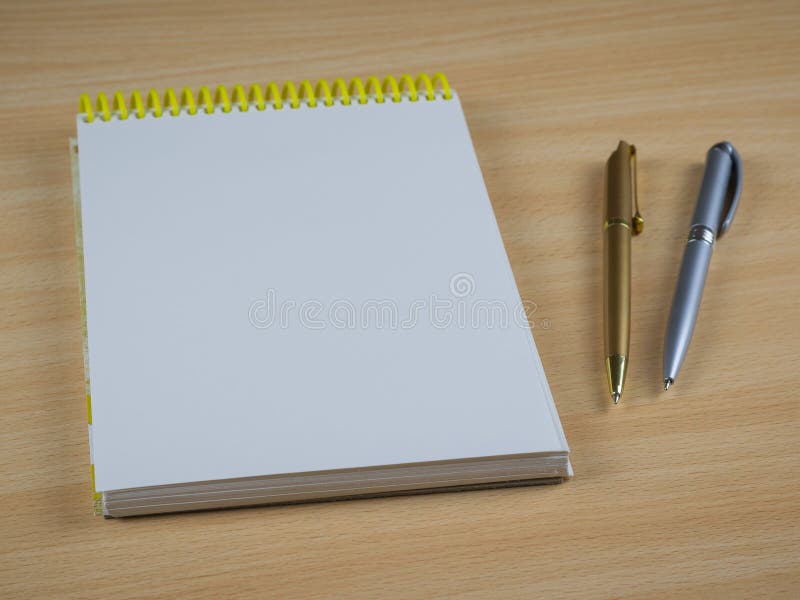 Two Ballpoint Pens with Notebook on a Wooden Table. Place for Your Text ...