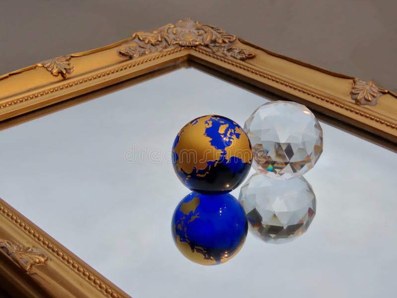 Two balls on mirror stock photo. Image of rich, magic - 195751202