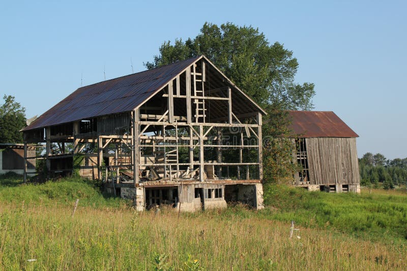 Two barns in early morning stock photo. Image of frame - 15416298