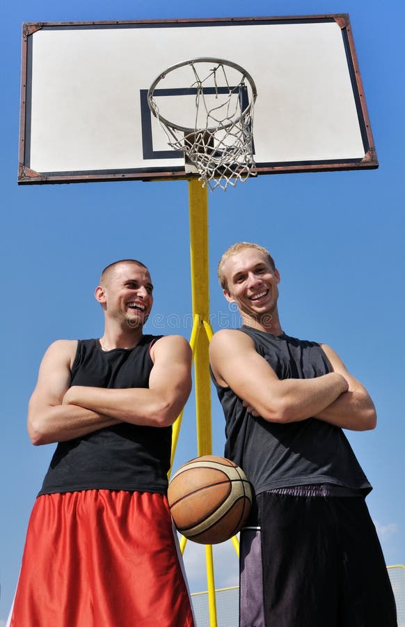 Two Basketball Players Smiling Stock Photo - Image of basket, tall ...