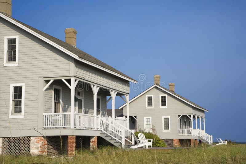 Two Beachfront Homes stock photo. Image of coast, horizontal - 12976404