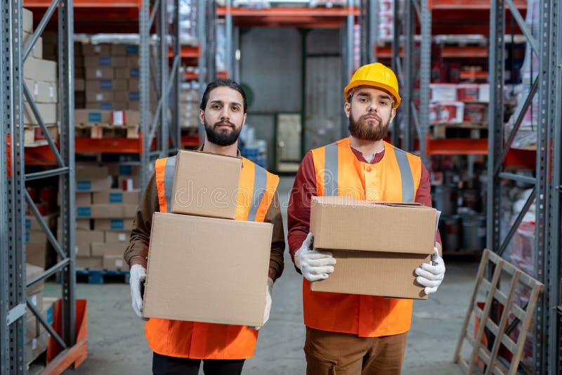 Two Bearded Workers Of Warehouse Holding Boxes Stock Photo - Image of ...
