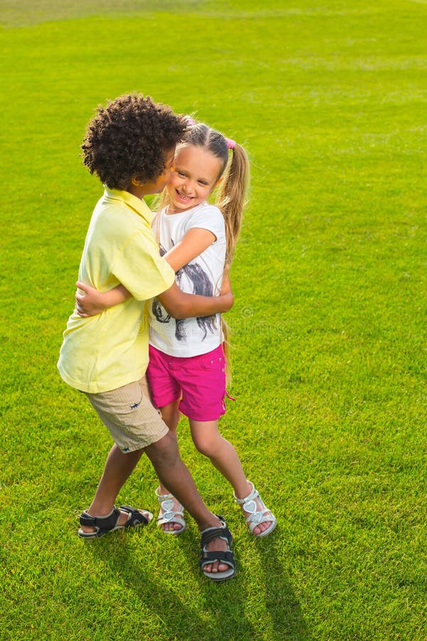 Two beautiful children. stock photo. Image of lawn, relax - 56153568