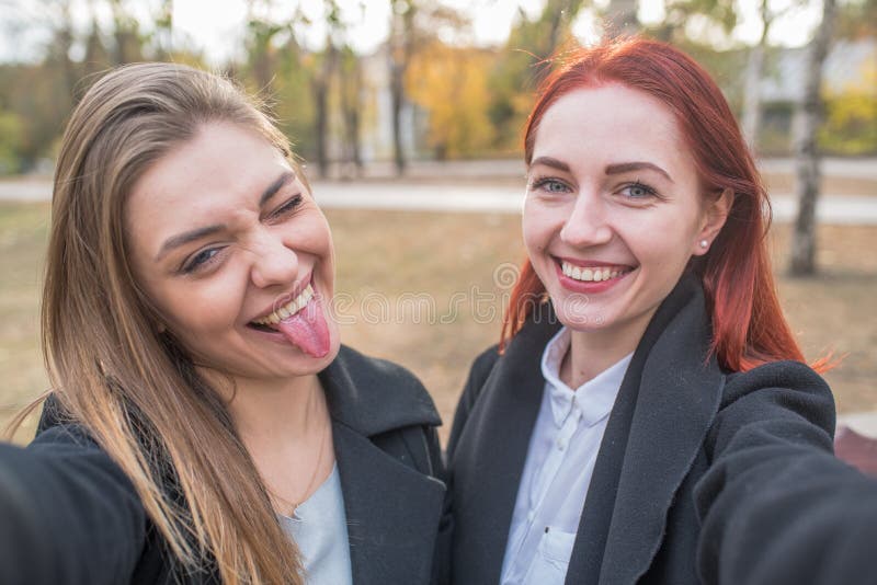 Two Beautiful And Cute Girlfriends Take A Selfie Stock Image Image
