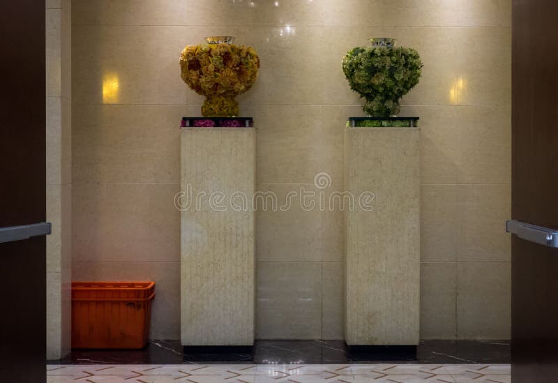 Two Decorative Columns with Flower Vases on Them Stock Photo - Image of ...