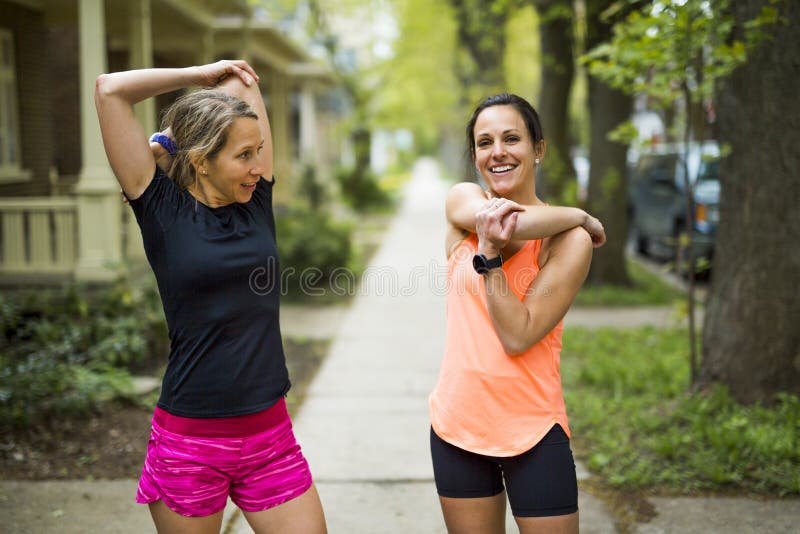 Two Beautiful Female Joggers Stock Photo - Image of marathon, middle ...