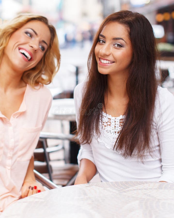 Two Beautiful Girls in Urban Backgrund, Black and Mixed Women Stock ...