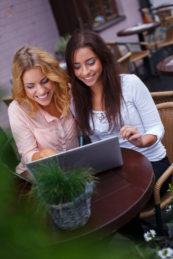 Two Beautiful Girls with Laptop Stock Image - Image of chatting, laptop ...