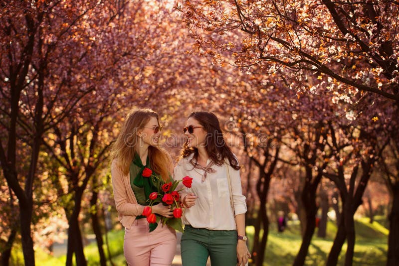 Two Beautiful Ladies in Spring Park Stock Image - Image of blooming ...
