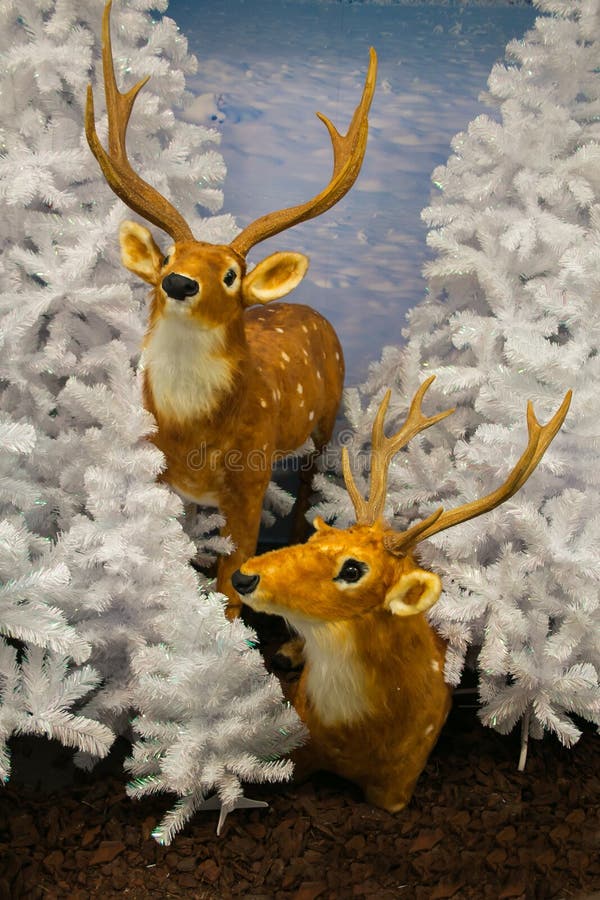 Two Beautiful Reindeer on White Christmas Tree Stock Image - Image of ...