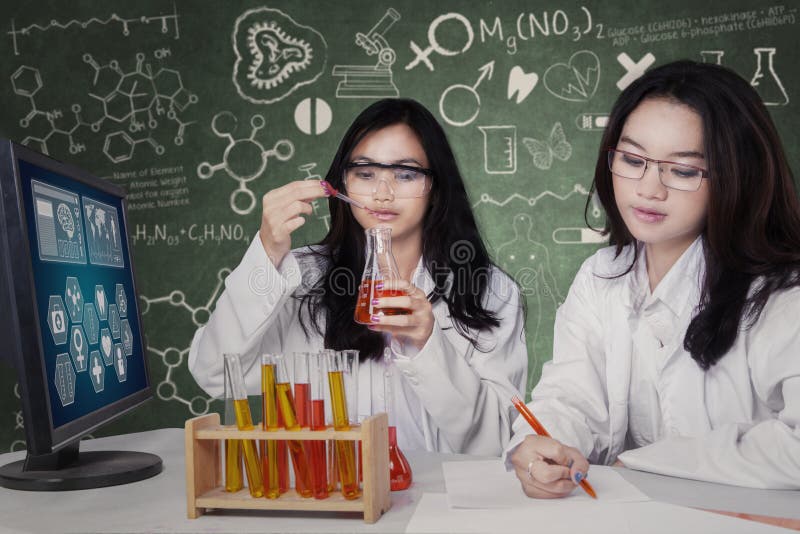 Two Beautiful Students Working in Lab Stock Image - Image of reaction ...