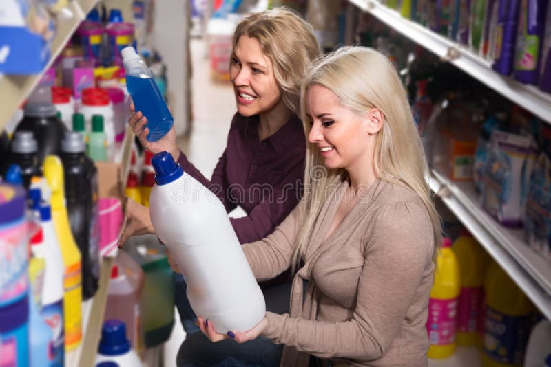 Two Beautiful Women Choosing Some Detergents Stock Photo - Image of ...