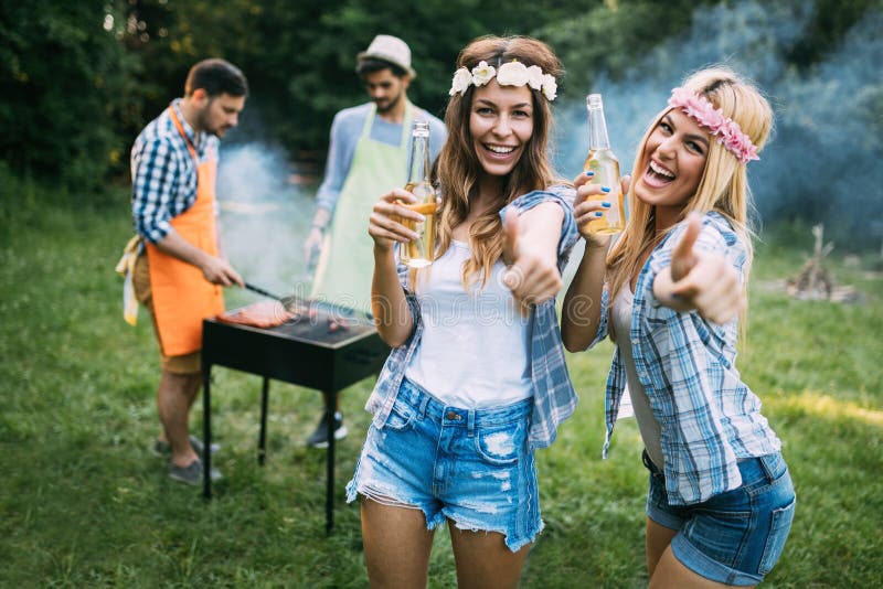 Two Beautiful Women Having Fun while Waiting for Barbecue Stock Photo ...