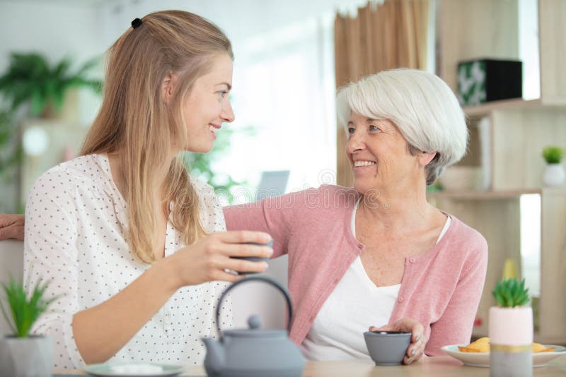 Two Beautiful Women-a Mother and Daughte Drink Tea Stock Photo - Image ...