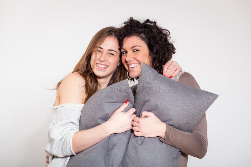 Two Beautiful Women with Pillow Stock Image - Image of friendship ...
