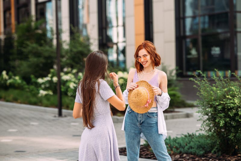Two Beautiful Women Talking and Standing Outdoors Stock Image - Image ...
