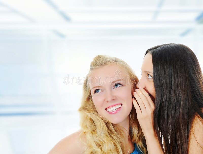 Two Beautiful Women Telling Secret Stock Photo - Image of female, long ...