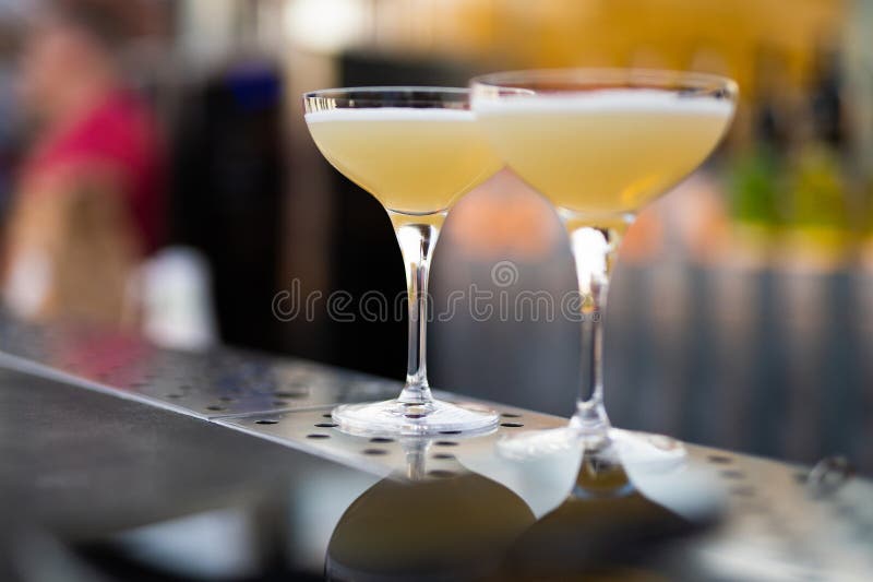 Two Beautiful Yellow Alcoholic Cocktails on the Bar Counter Stock Photo ...