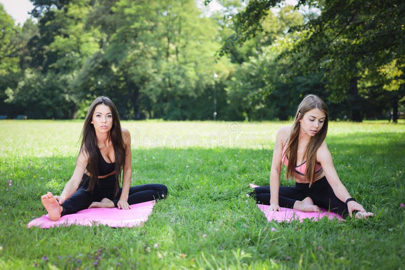 Women practicing yoga stock image. Image of morning - 125017777