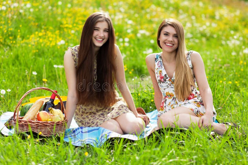 Two Beautiful Young Women on a Picnic Stock Image - Image of grass ...