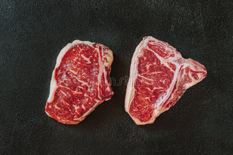 Two beef steaks stock photo. Image of angus, board, meat - 195062534