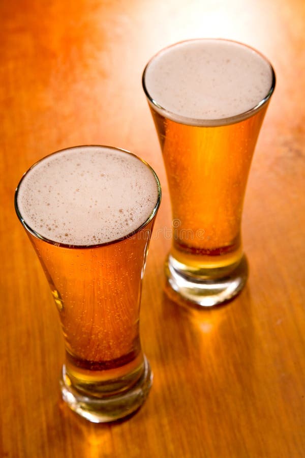 Two beer glasses stock photo. Image of beer, draft, vertical - 7461542