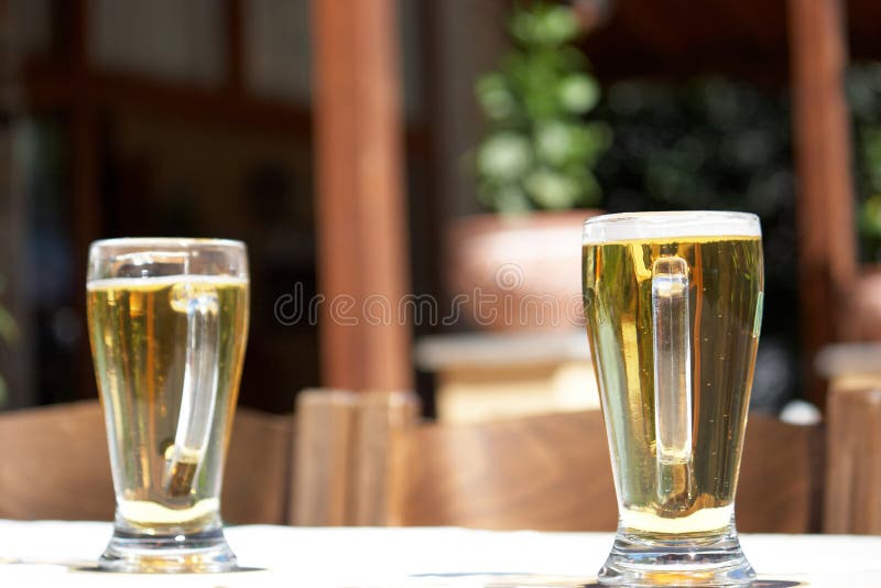 Two Beers stock image. Image of outdoors, beer, beverage - 16977757