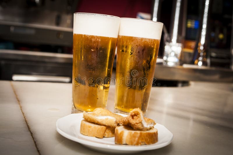 Two beers stock image. Image of amber, alcohol, food - 33906839