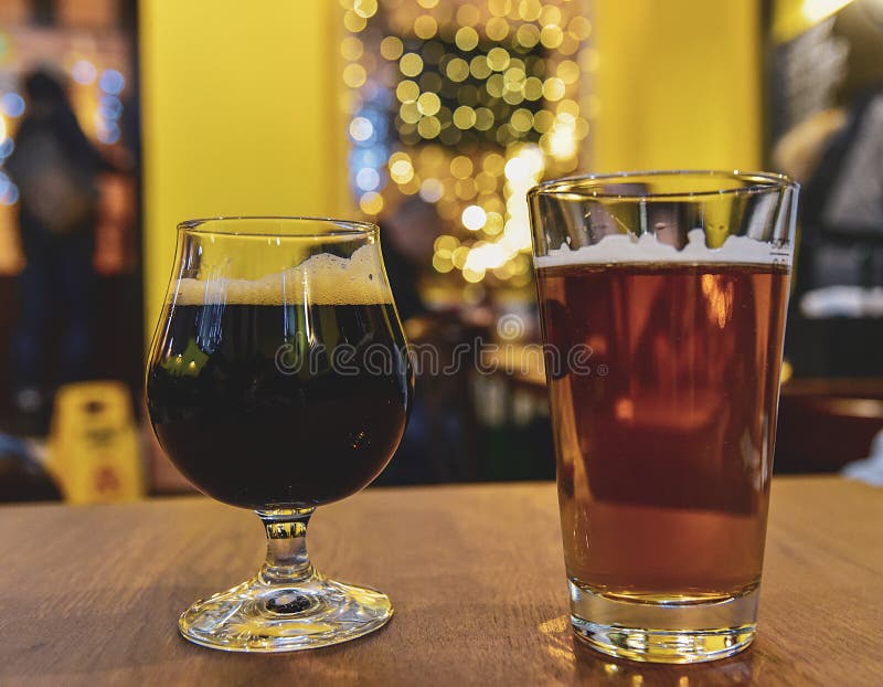 Two Beers, light and dark stock image. Image of dark - 136885235