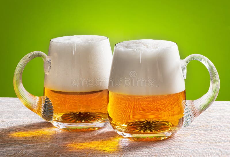 Two beers on the table stock image. Image of filled, full - 63218583