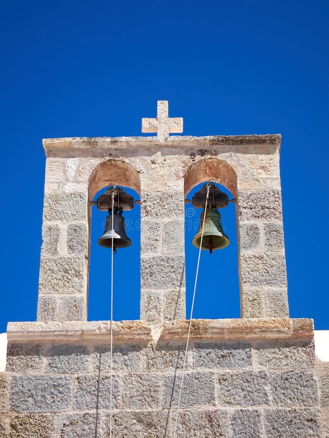 Two bells on a steeple stock photo. Image of background - 21134636