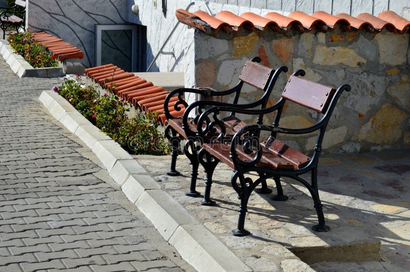 Two benches stock photo. Image of building, shadow, park - 128266058