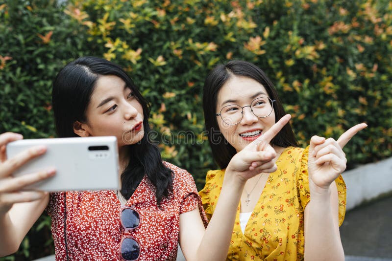 Two Best Friends Vlogging or Taking Selfie with Smartphone Stock Photo ...