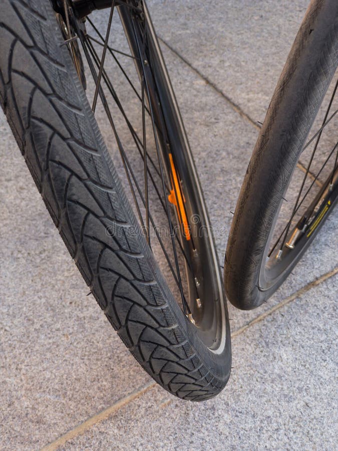 Two Bicycle Wheels with Different Types of Tires Installed Stock Image ...