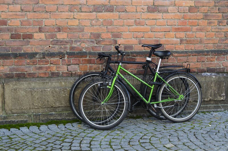 Two bicycles stock photo. Image of bicycles, pedal, wall - 61734142