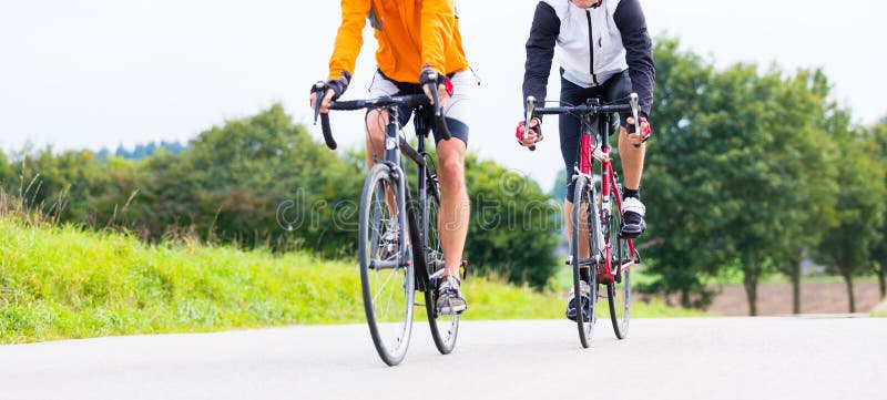 Two Bicyclists Doing Sport with Their Bikes Stock Image - Image of ...