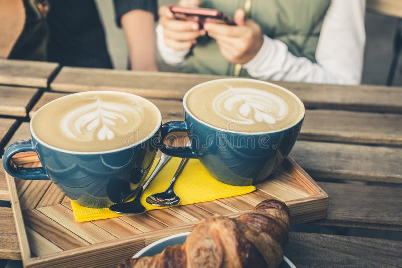 Two Big Cappuccino and Croissant on a Table in a Cafe Stock Image ...