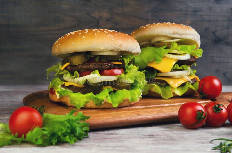 Two Big Cheeseburger Deluxe Stock Image - Image of fast, food: 66379031