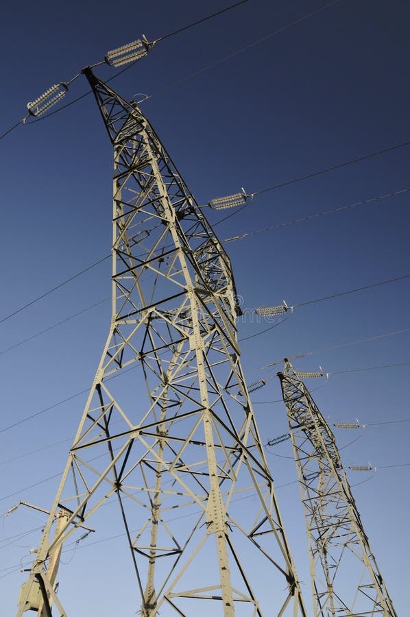 Two Big Electricity Pylons stock image. Image of blue - 27823415