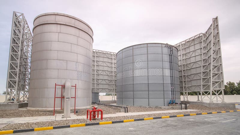 Two Big Silver Water Tanks with Fence Timelapse Stock Image - Image of ...