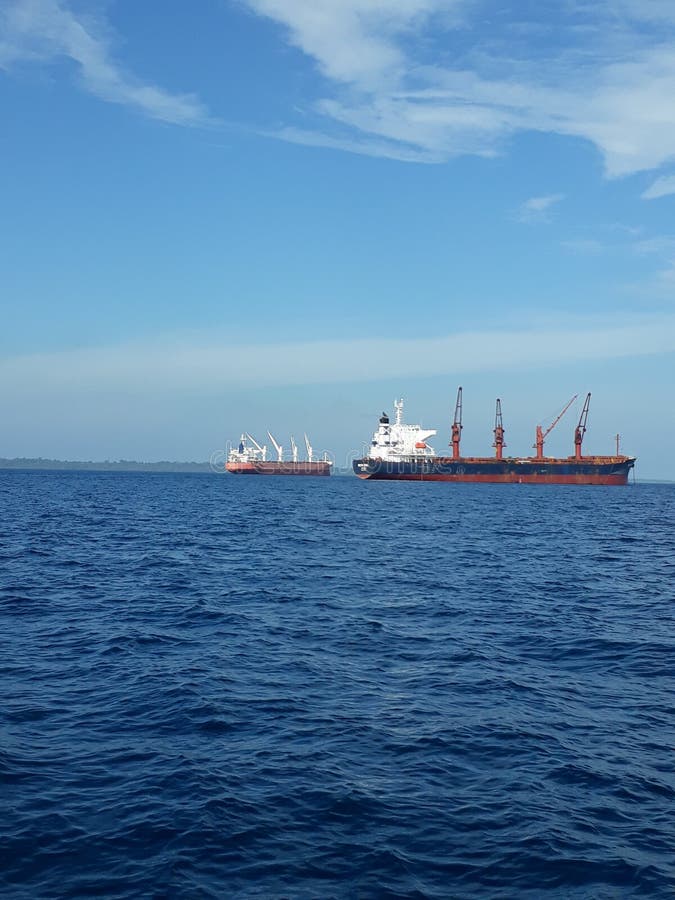 Two big vessel at sea stock image. Image of blue, sunlight - 191469201