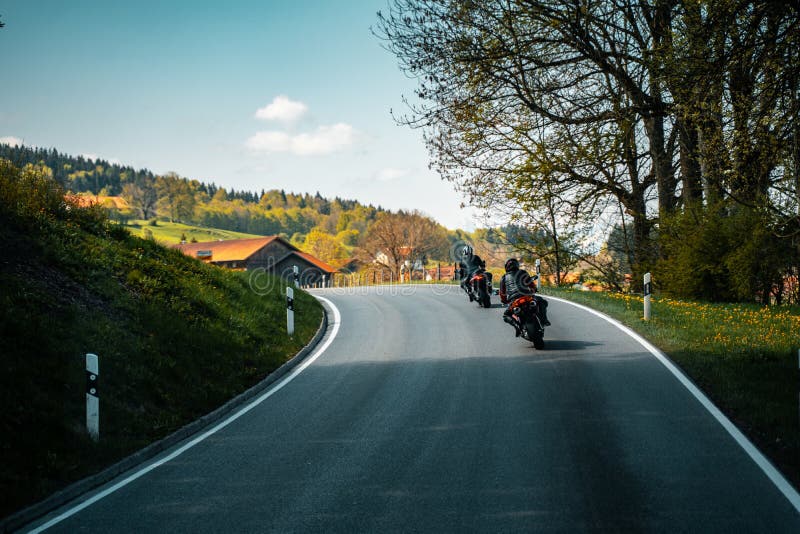 Two Biker Riding Alone on Mountainous Road Stock Image - Image of ...