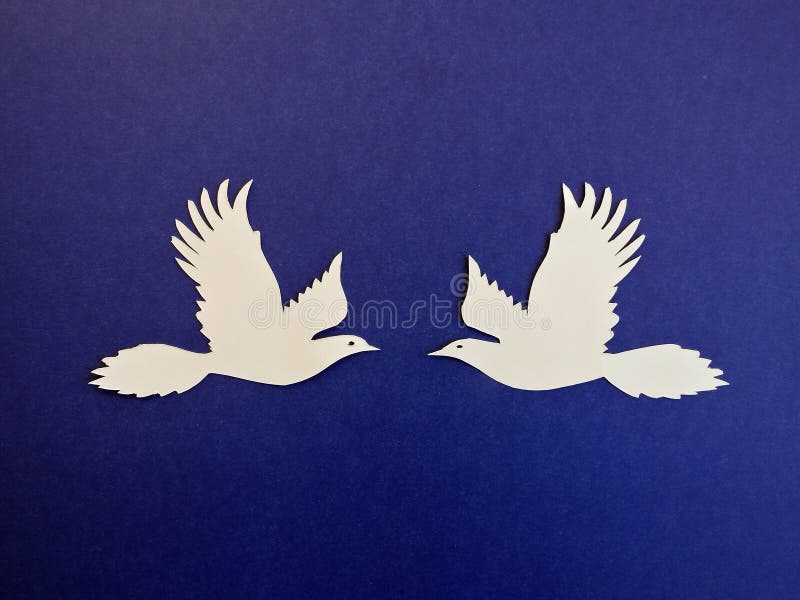 Two birds. Paper cutting. stock photo. Image of idea - 64331070