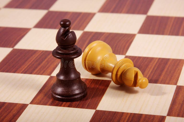Two bishops on chess board stock photo. Image of intelligence - 12801004